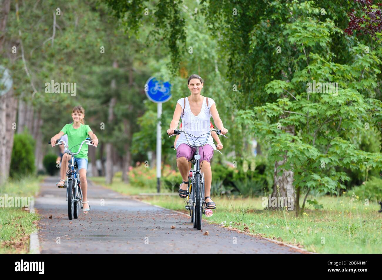 Ride a bike with mom hi-res stock photography and images - Alamy
