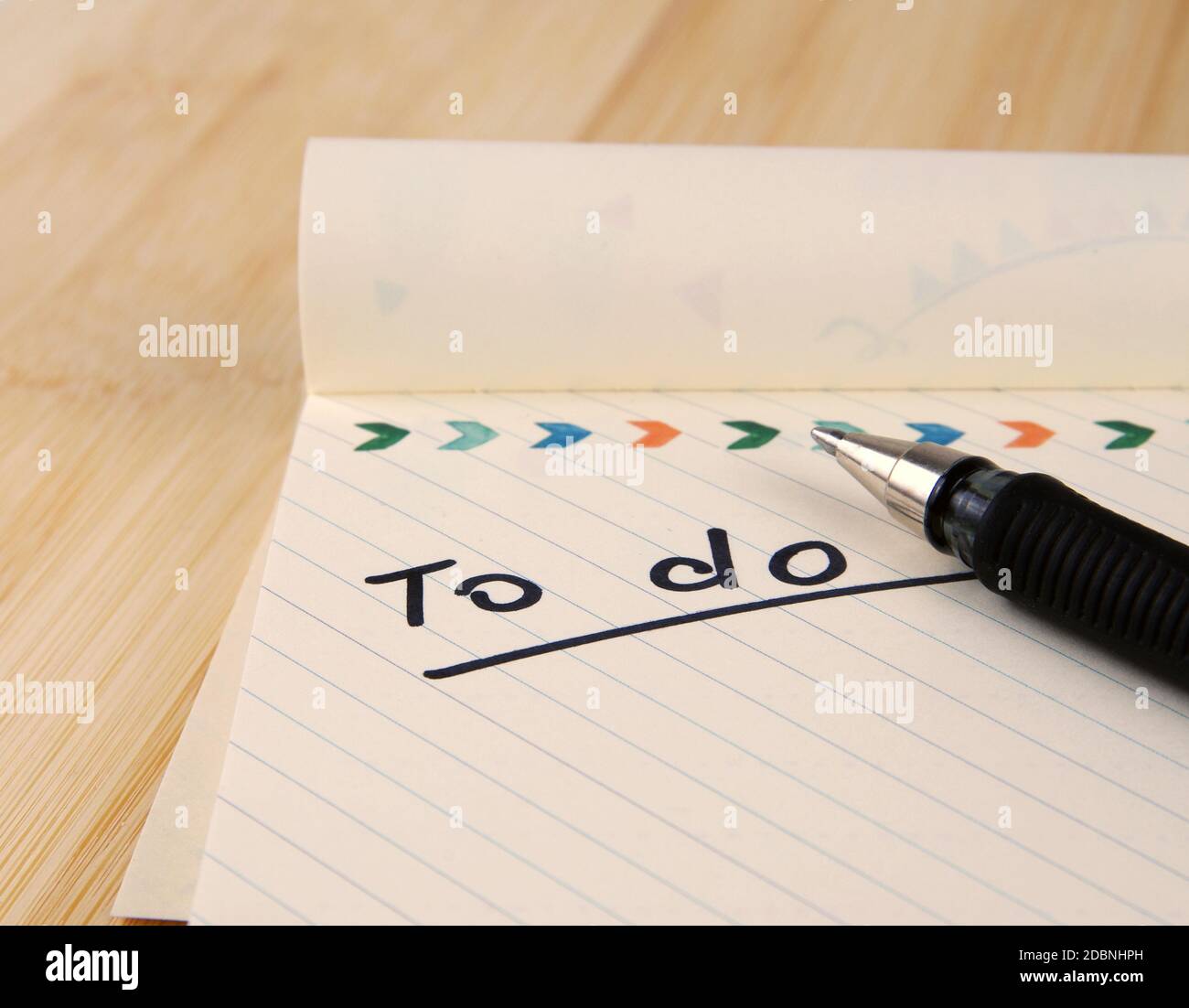 to do list notepad over table Stock Photo - Alamy