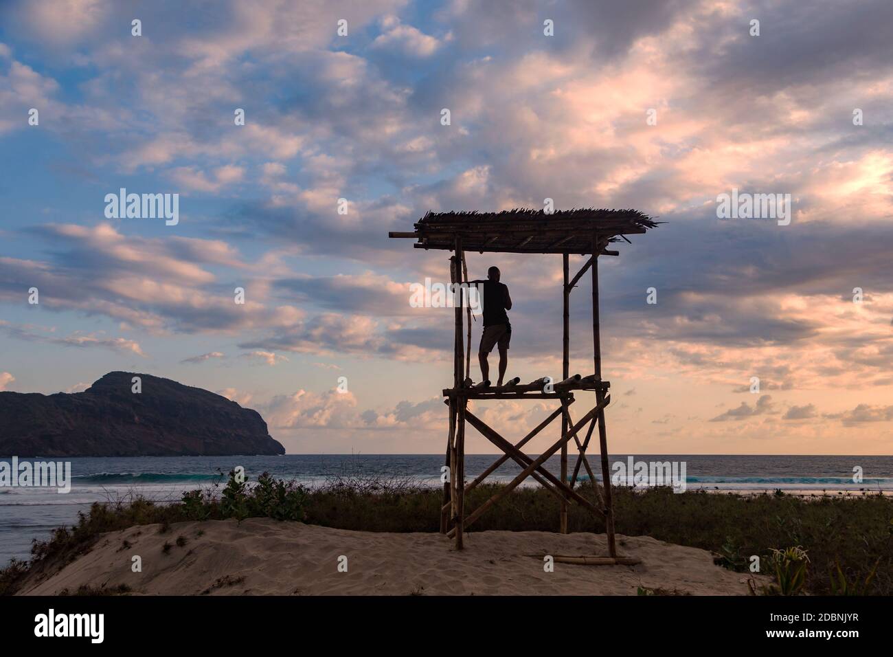 Man admiring coastal view, Sumbawa, Indonesia Stock Photo - Alamy