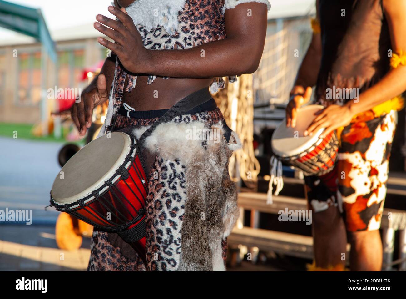 An African drummer plays the djembe Stock Photo - Alamy