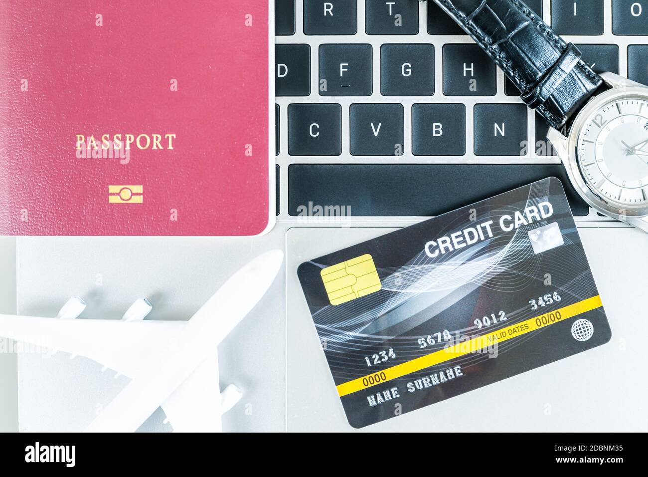Smart phone, passport, credit card,wacth on keyboard, Traveling concept ...