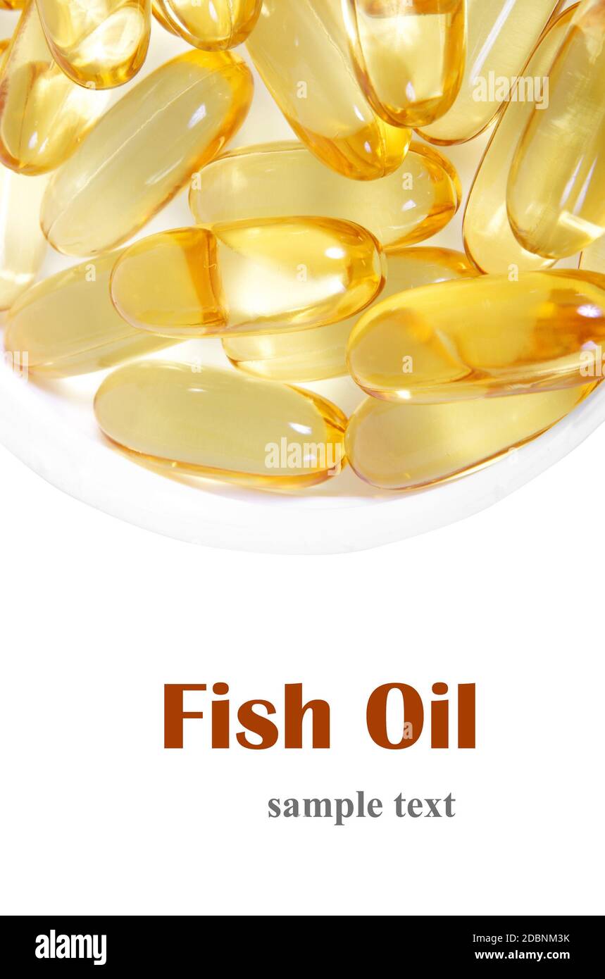 fish oil capsules with space for text Stock Photo - Alamy