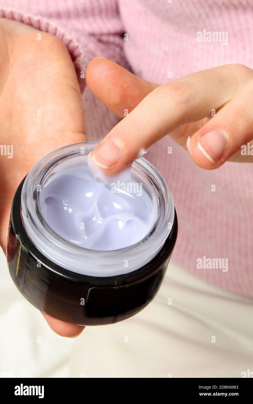 female hands apply cream body cream Stock Photo - Alamy
