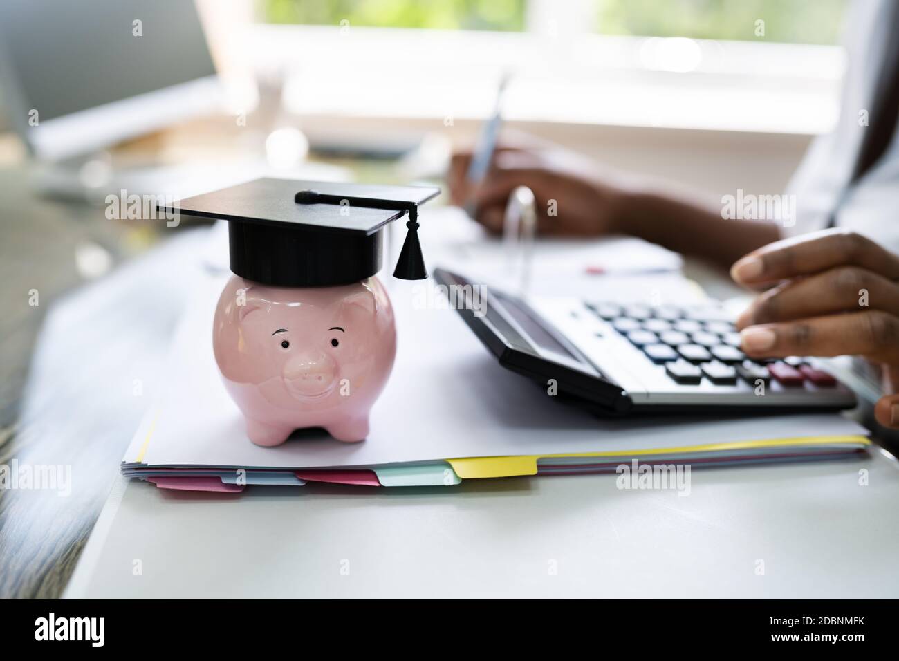 African American Women Accounting With Graduation Cap Stock Photo - Alamy