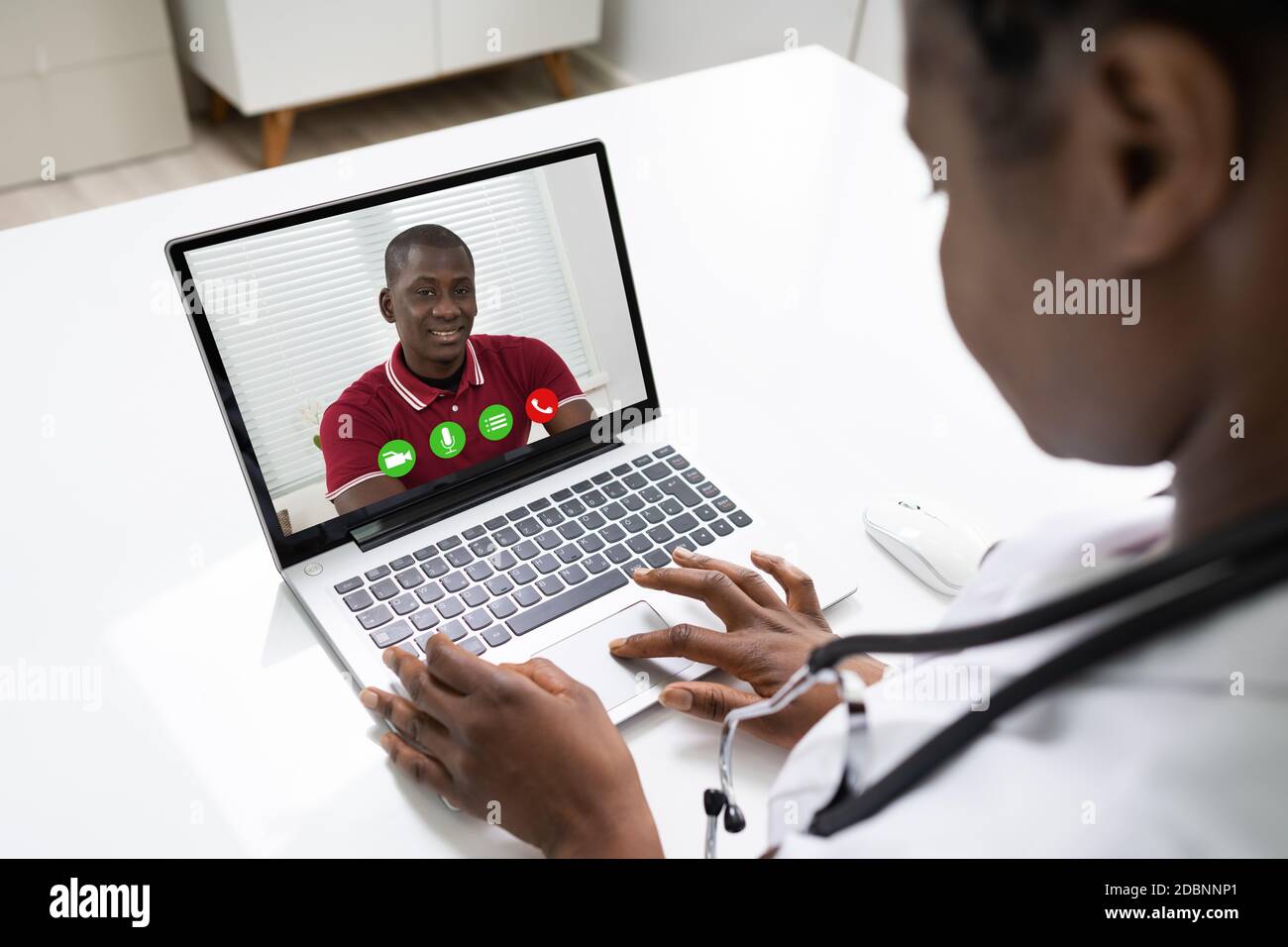 African Doctor In Video Conference Call Talking With Patient Stock ...