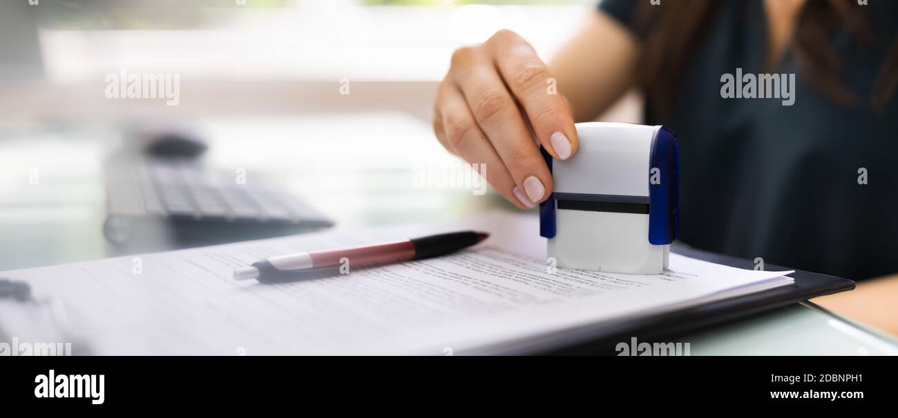 Record Or Permit Document Paper Stamper In Office Stock Photo - Alamy