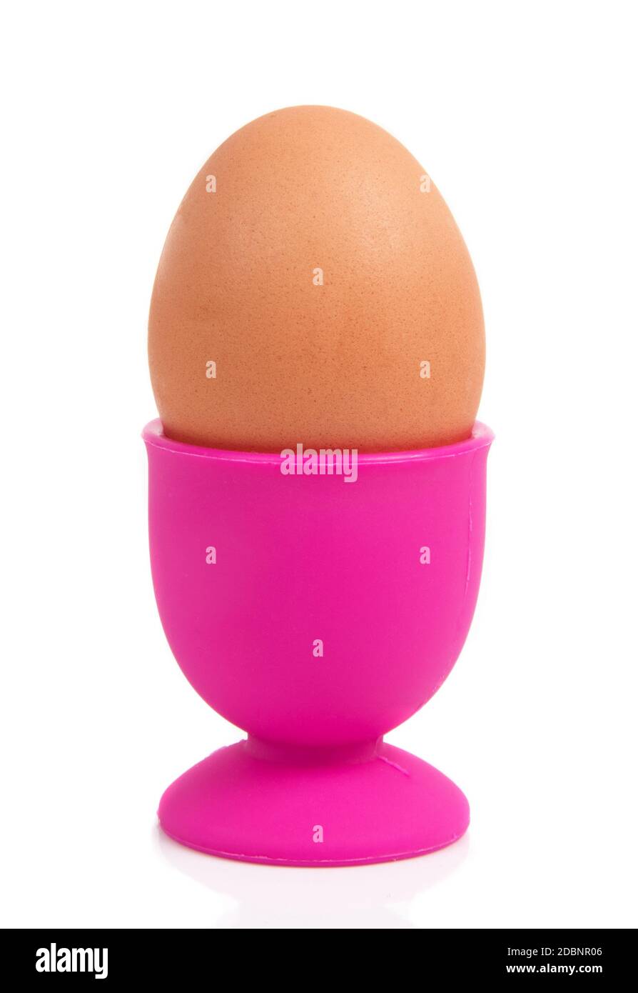 egg closeup in pink holder Stock Photo - Alamy