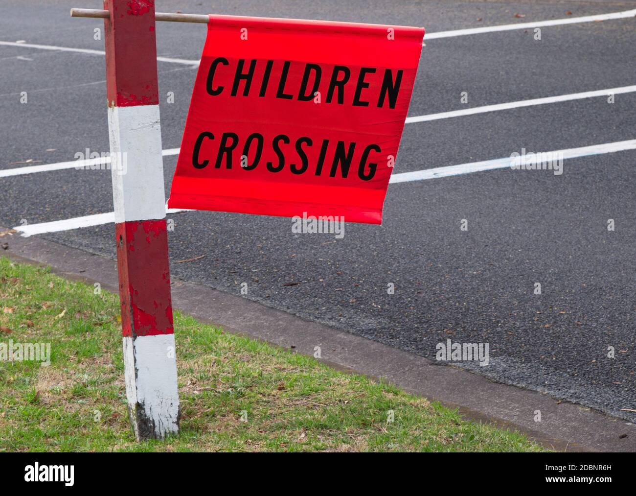 Children crossing closeup sign outdoors Stock Photo - Alamy