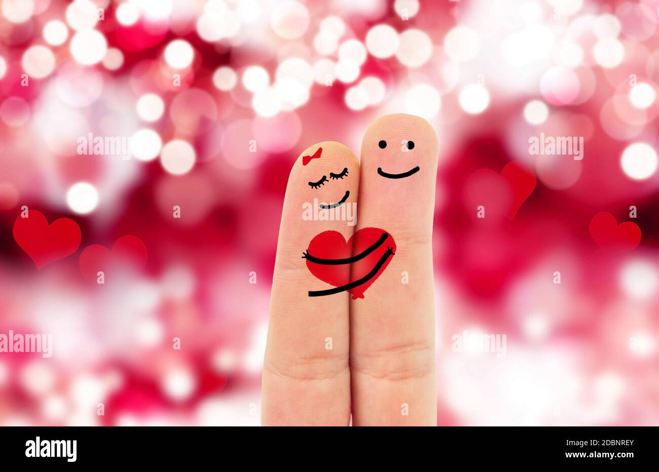 romantic two fingers in love Stock Photo - Alamy