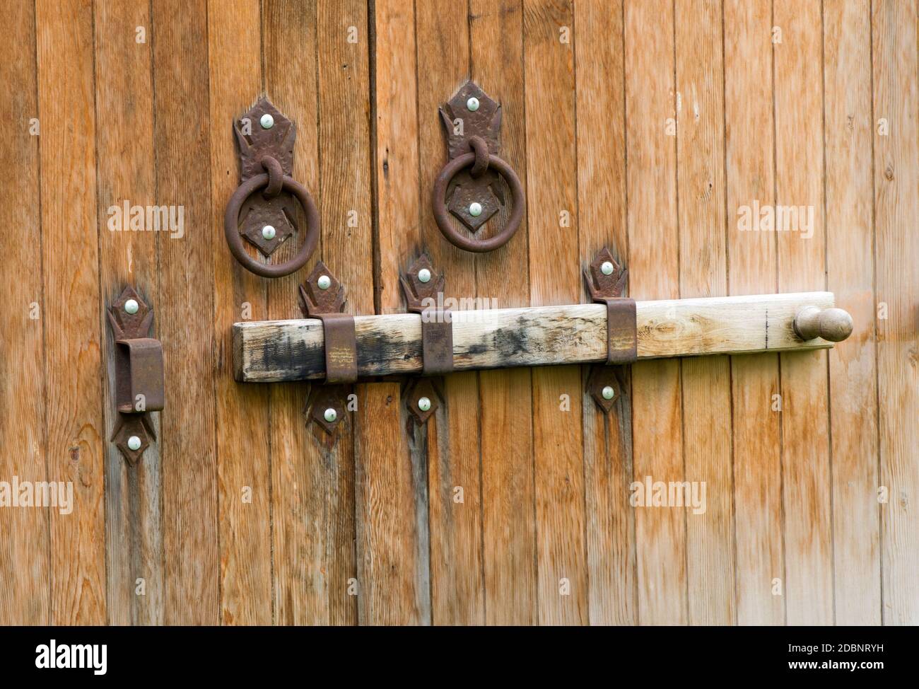 Old antique wooden gate lock Stock Photo - Alamy