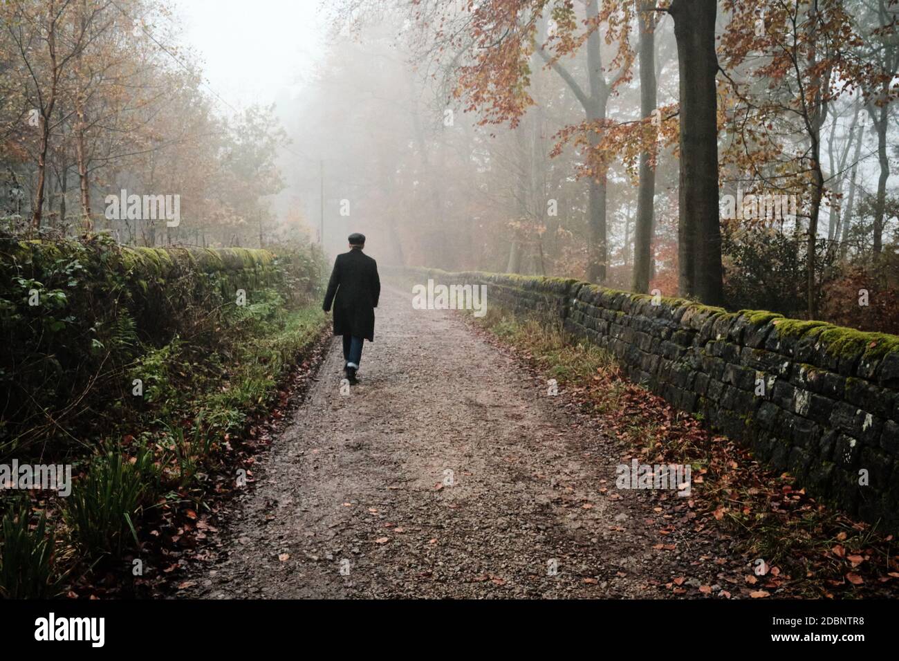 Walking on a mist covered track hi-res stock photography and images - Alamy