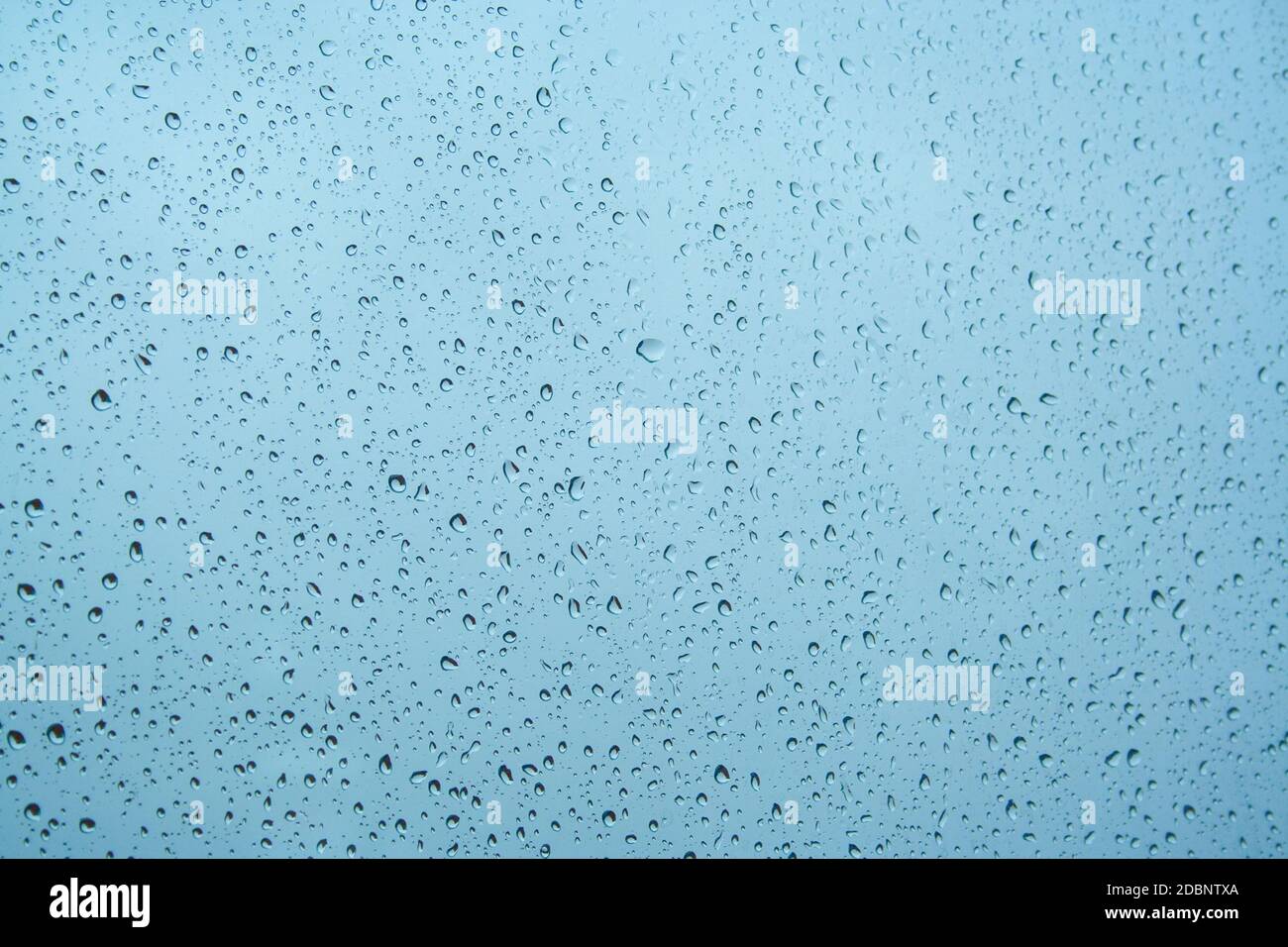 Abstract texture of raindrops at rainy day on glass Stock Photo - Alamy