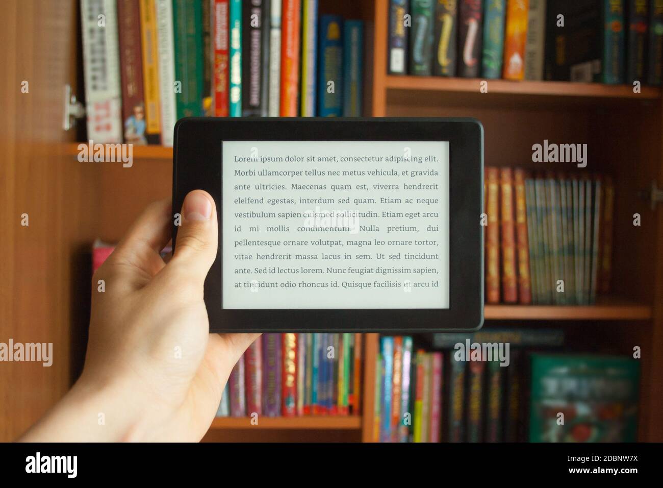 Hand held books hi-res stock photography and images - Alamy