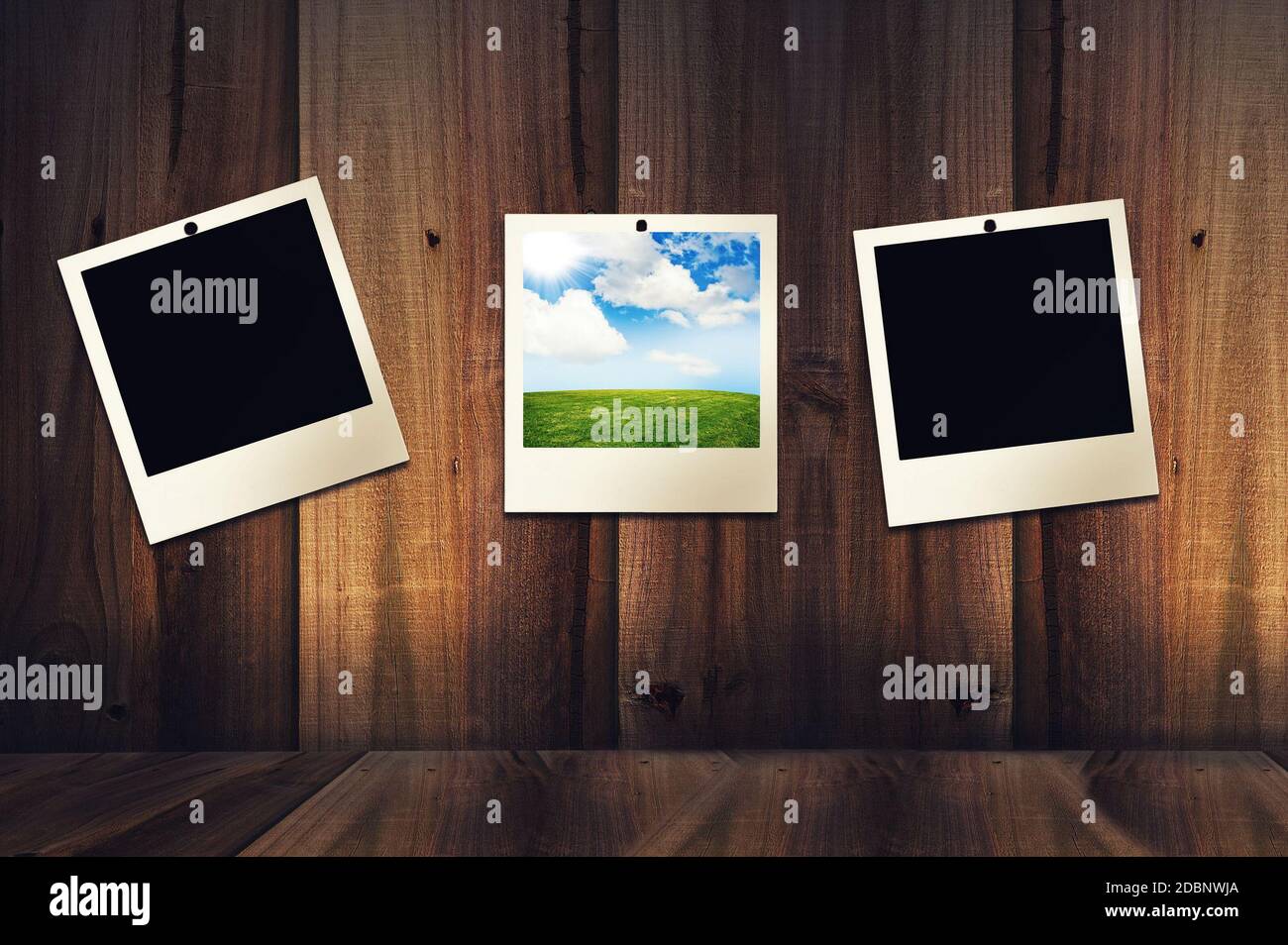 instant photo hanging on wall Stock Photo - Alamy