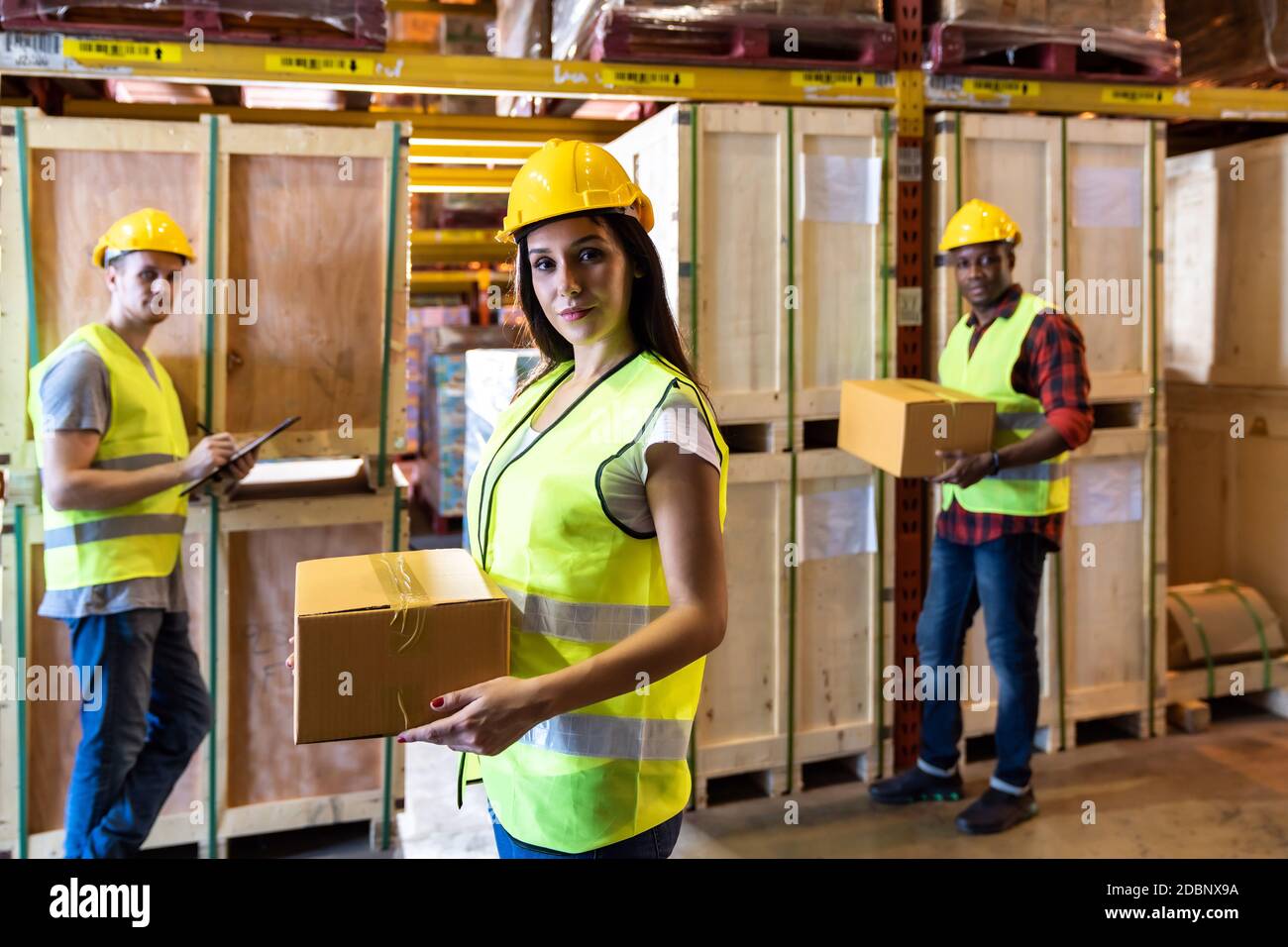Portrait of caucasian white woman warehouse worker hold parcel box with ...