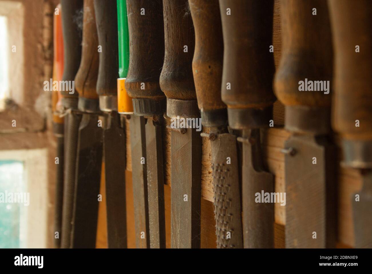 Several old dusty files hang in a row Stock Photo - Alamy