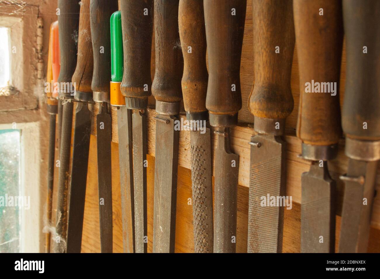 Several old dusty files hang in a row Stock Photo - Alamy