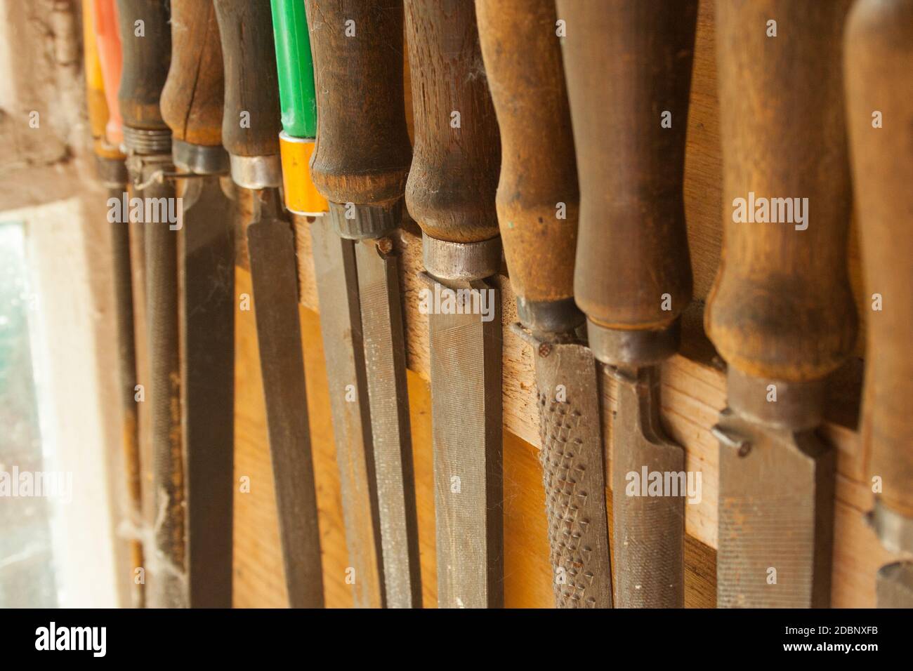 Several old dusty files hang in a row Stock Photo - Alamy