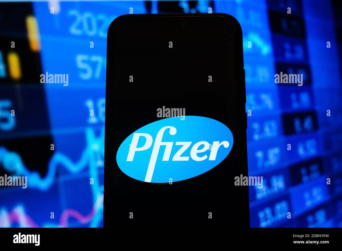 In this photo illustration a multiple exposure image shows a Pfizer ...