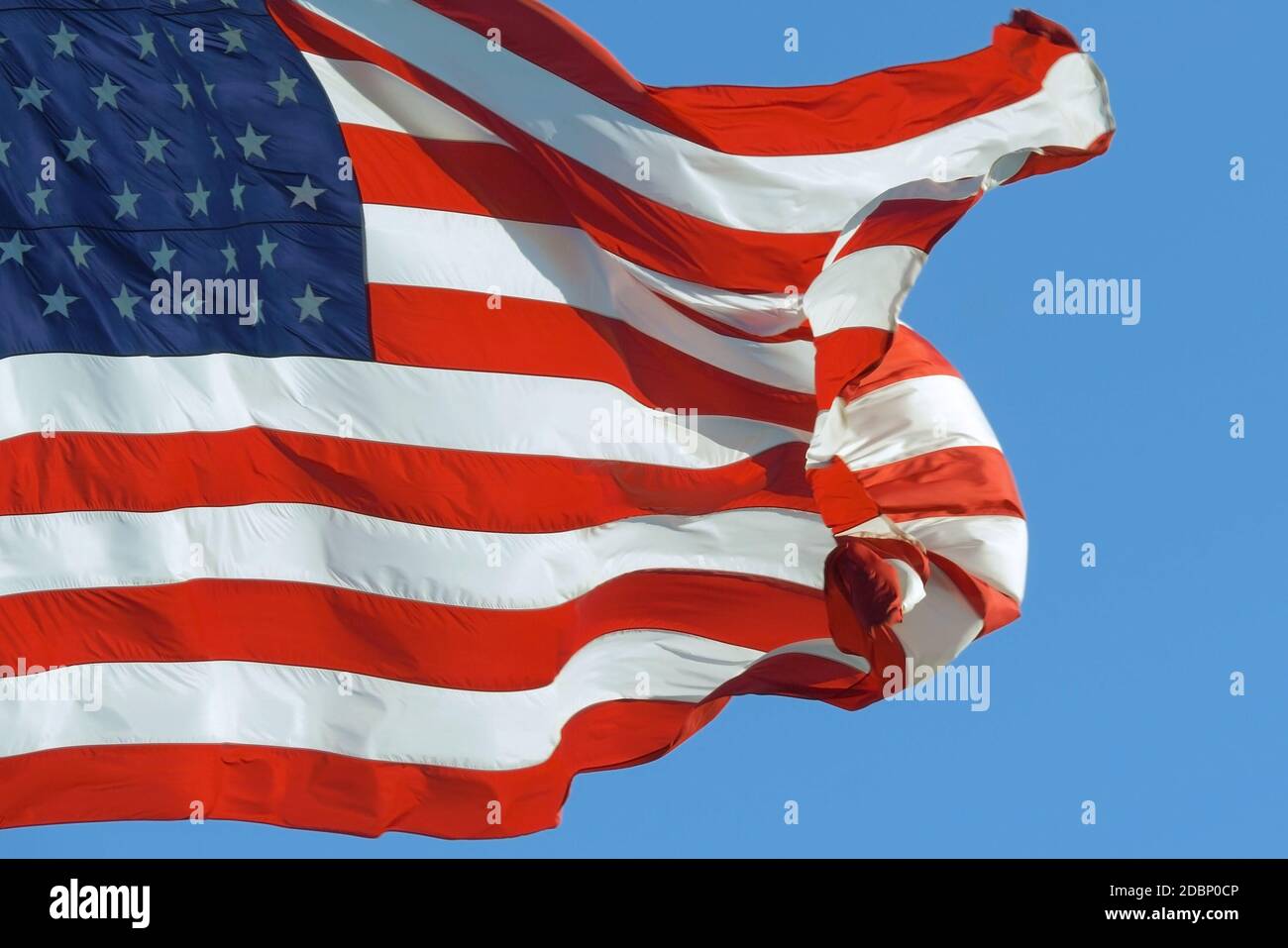 American flag waving proudly in the wind, representing. United States ...