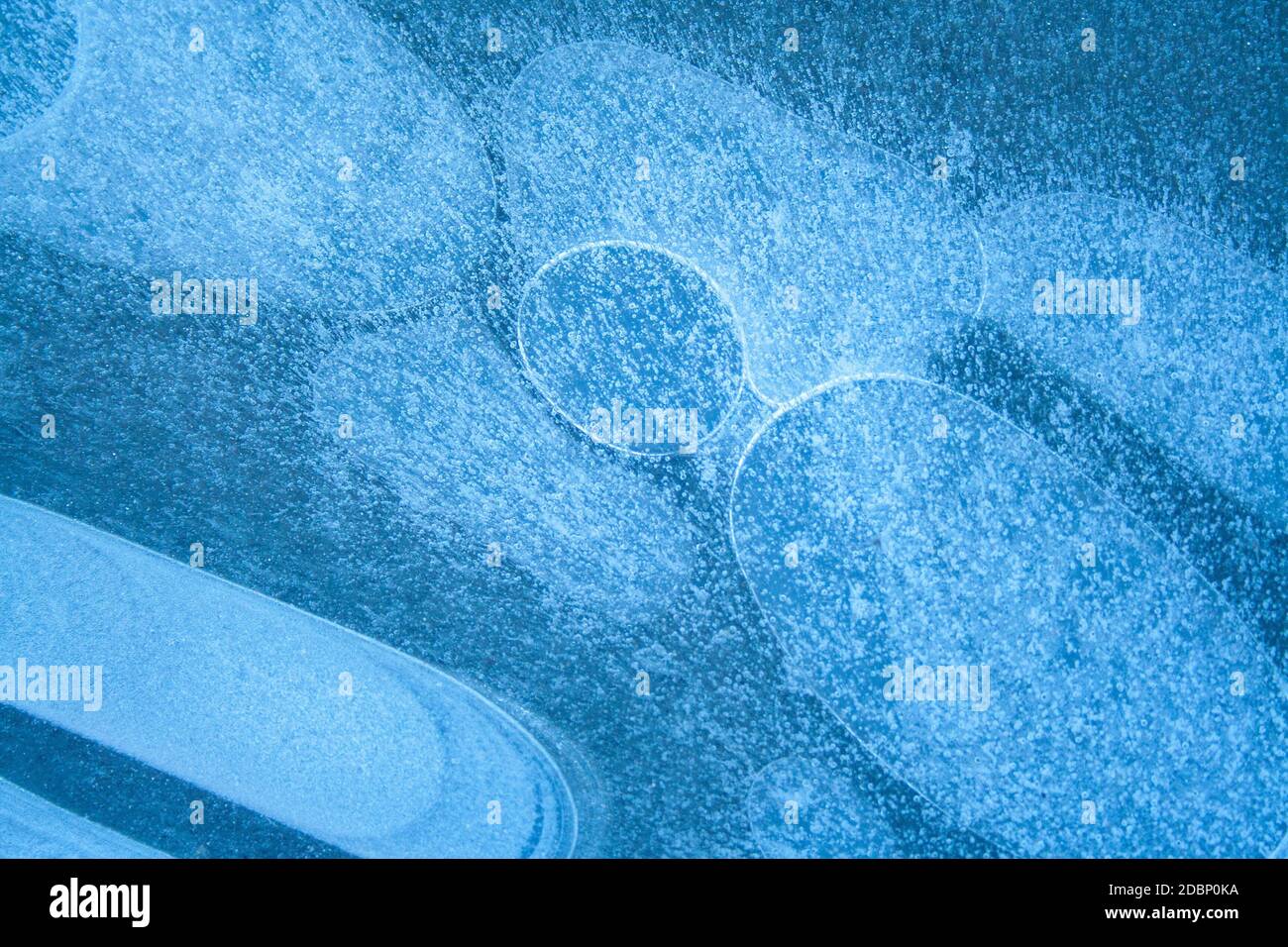 Pattern of frozen water with air bubbles. Frozen water texture Stock ...
