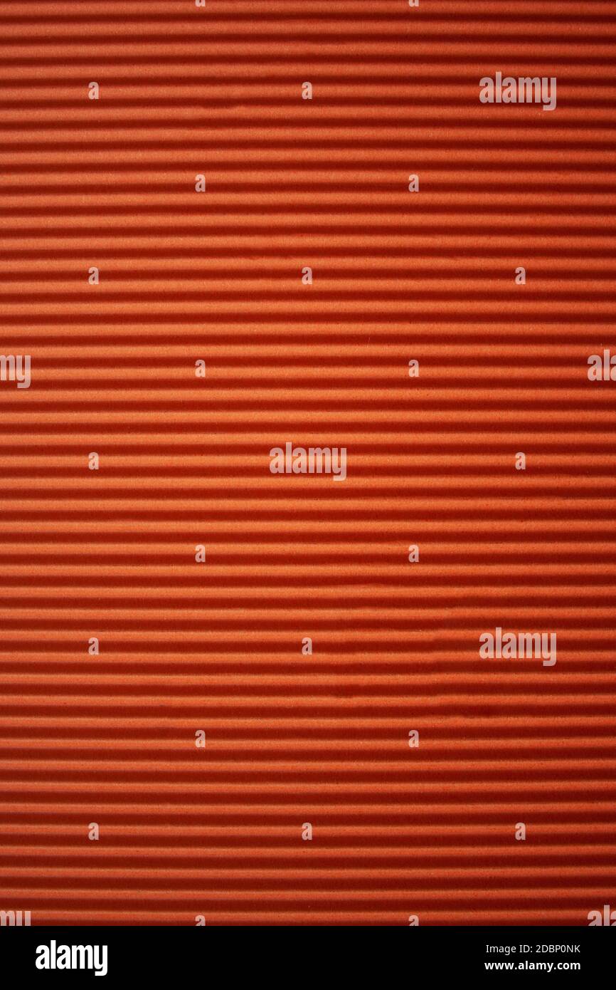Red corrugated paper texture. Abstract red background Stock Photo - Alamy