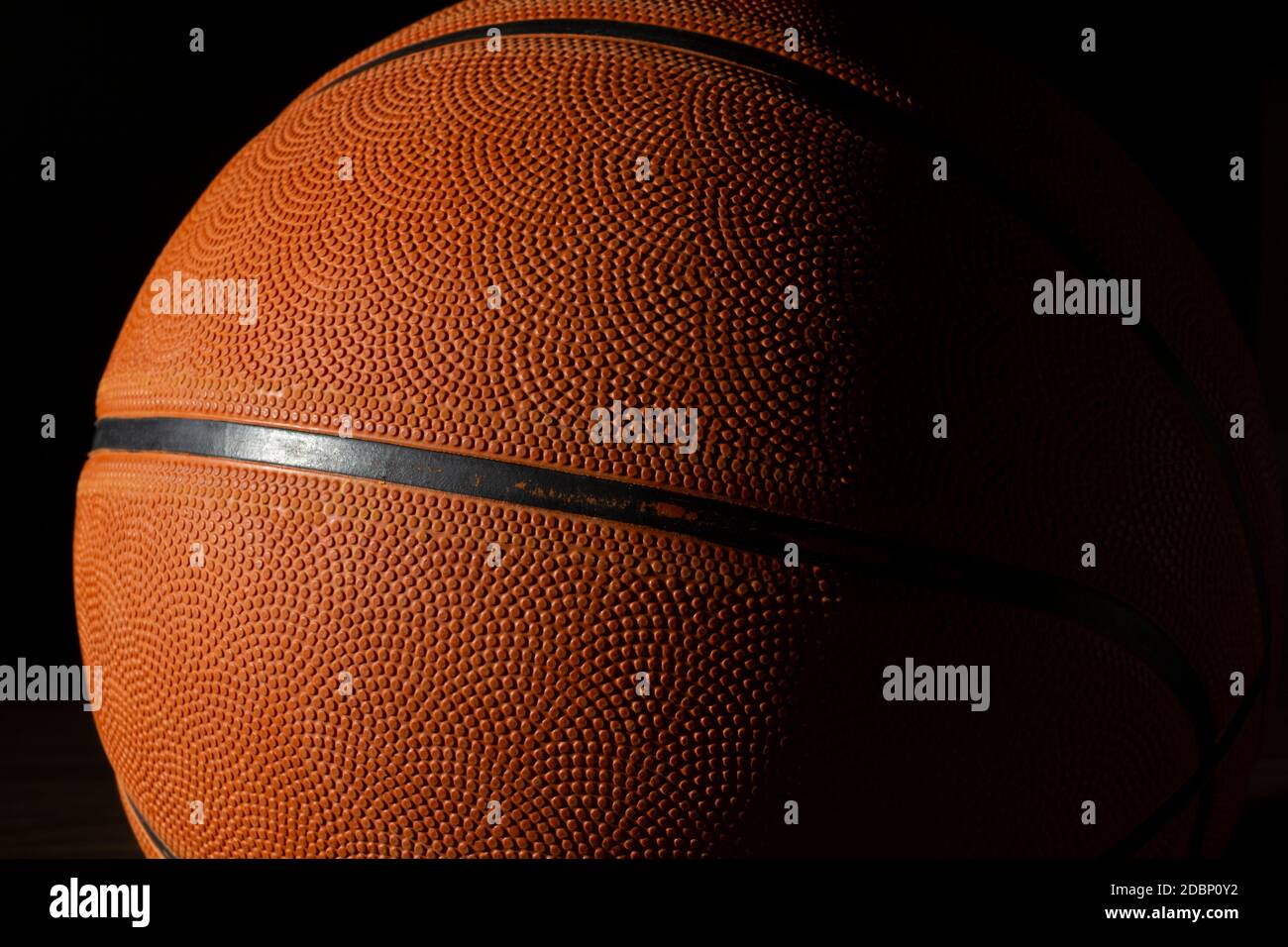 Basketball ball close up with dark background Stock Photo - Alamy