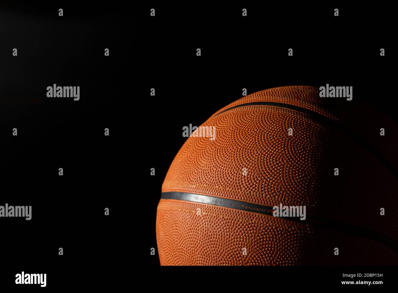 Basketball ball in a dark background Stock Photo - Alamy