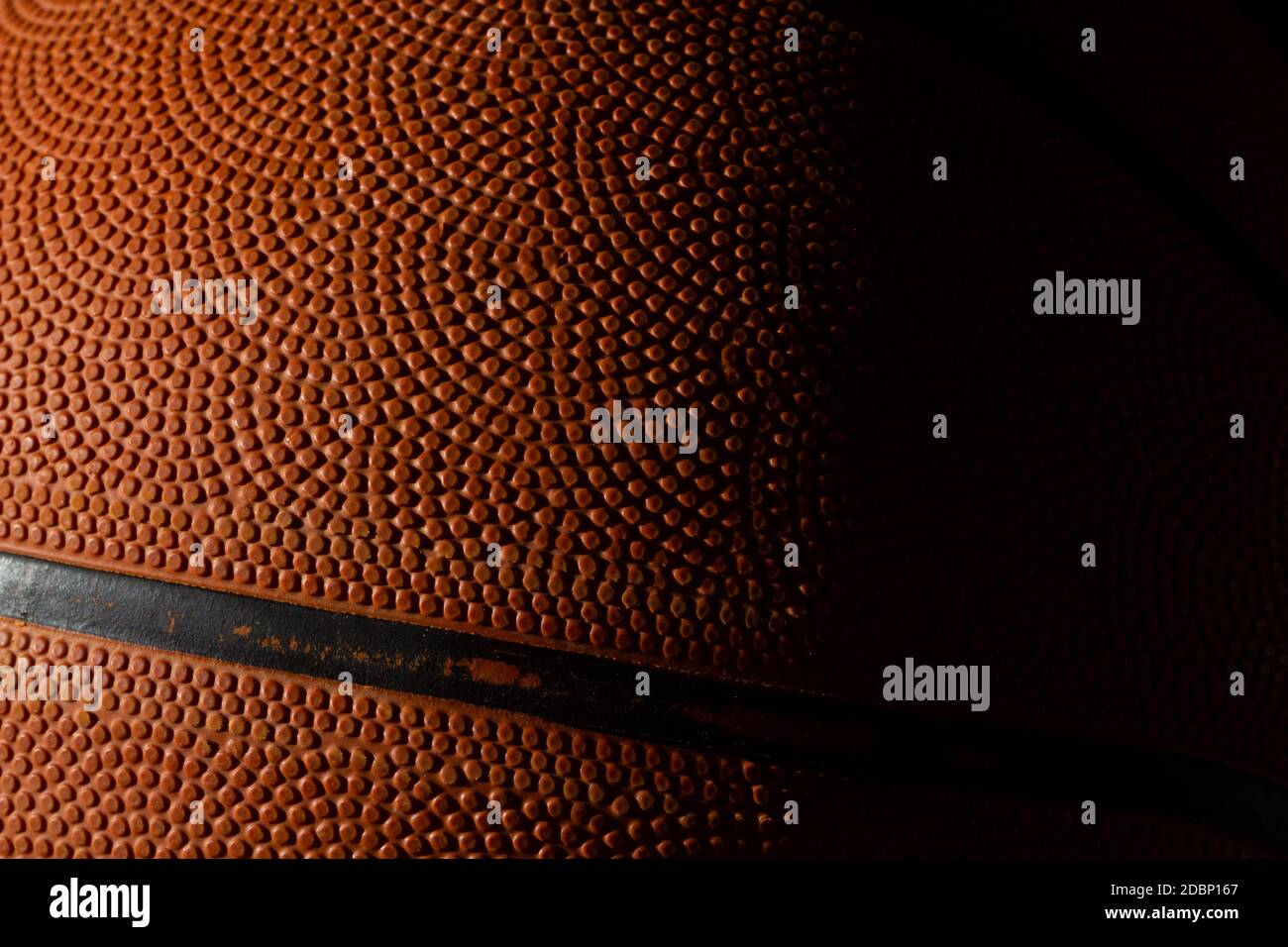Basketball ball close up with dark background Stock Photo - Alamy