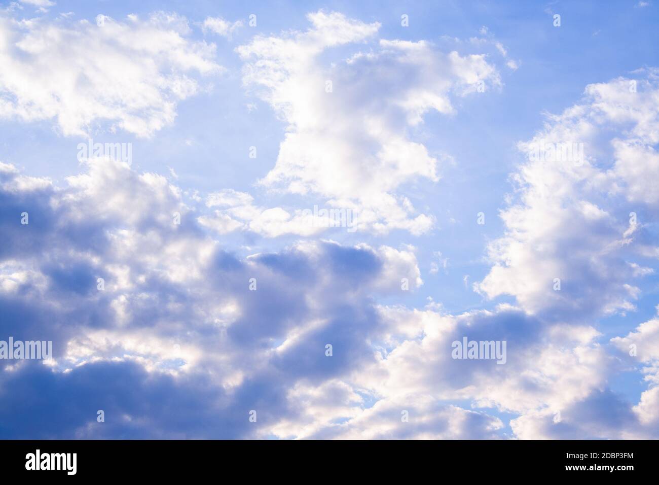 White clouds high in the sky at windy winter day background Stock Photo ...