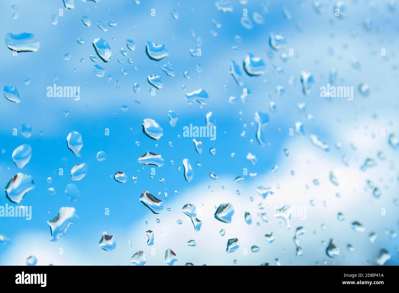 Water drops after rain on clean glass. Beautiful drops texture ...