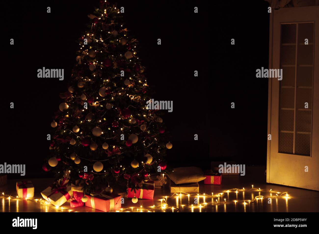 Christmas tree lights and New Year's Eve Stock Photo - Alamy