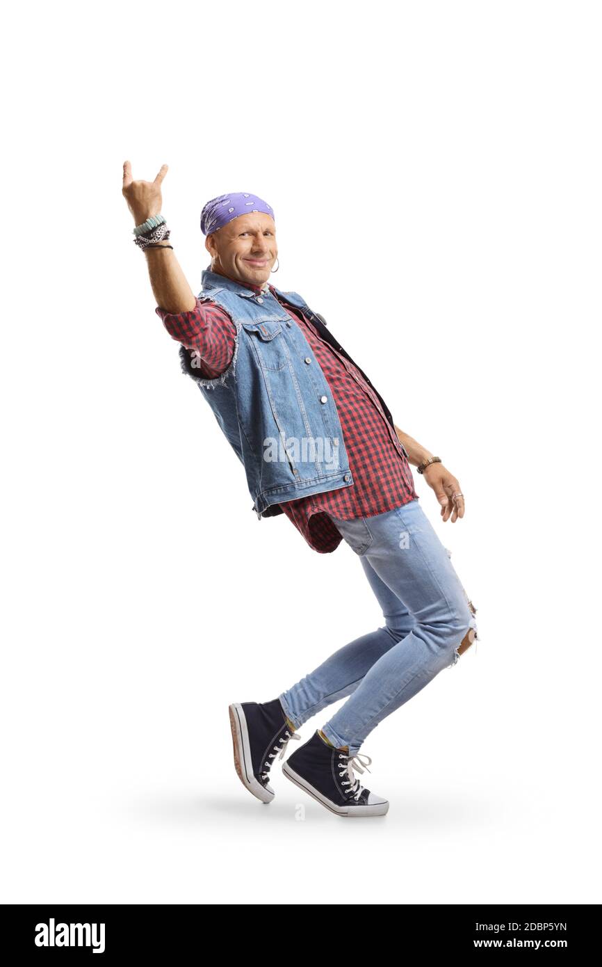Full length shot of a man with a head scarf dancing isolated on white ...