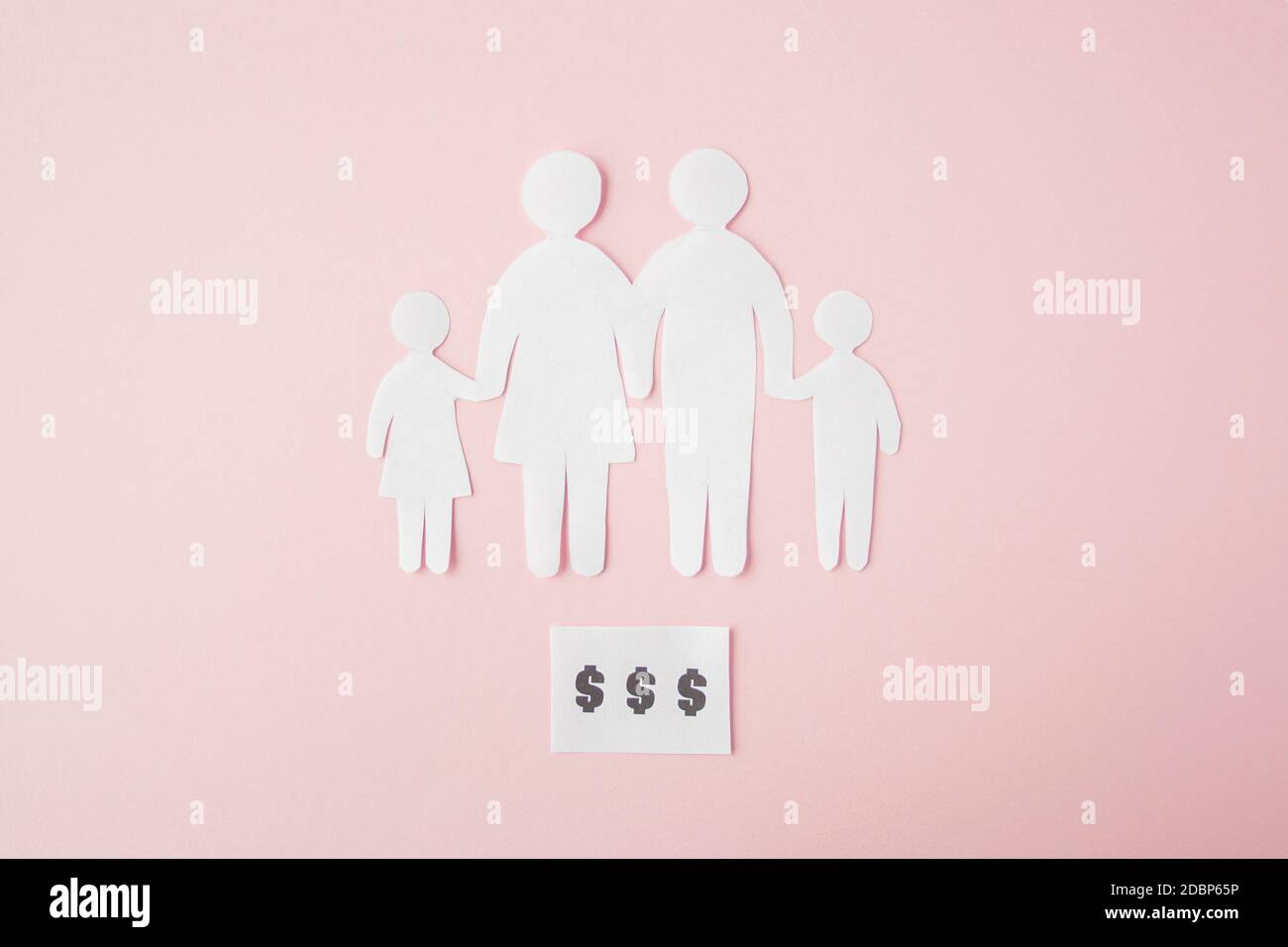 paper family cut out on bright pink background, family home, foster ...