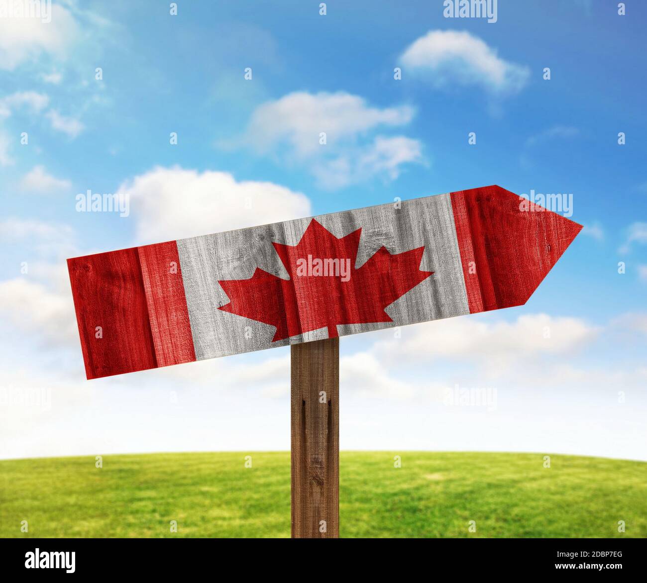 Canada wooden direction sign on nature background Stock Photo - Alamy