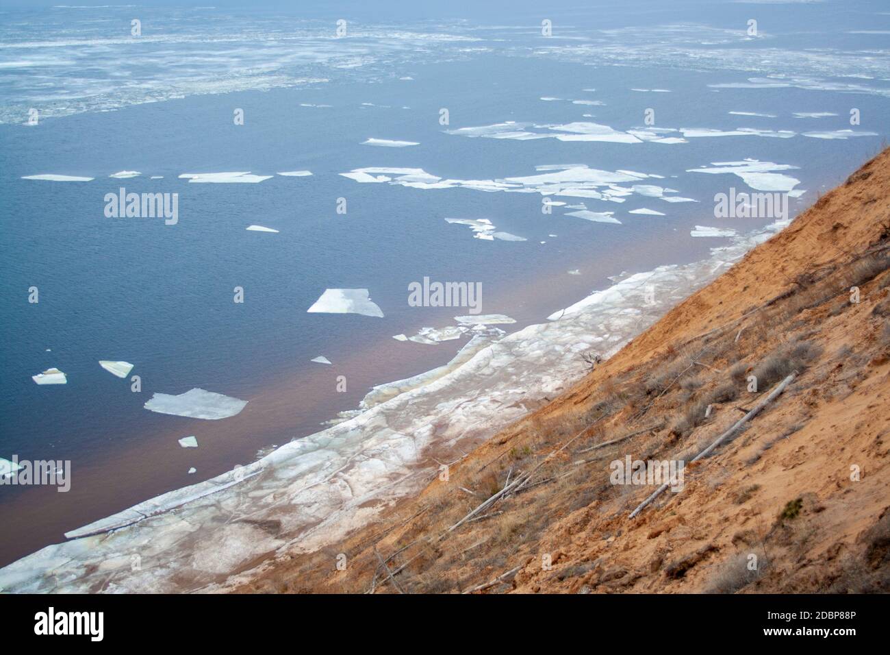 View of the Volga River from a high cliff in the spring afternoon ...