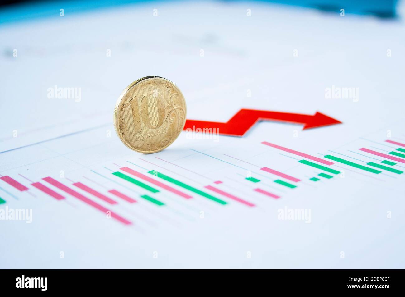 ten rouble coin on currency graph with red arrow down. exchange rate ...