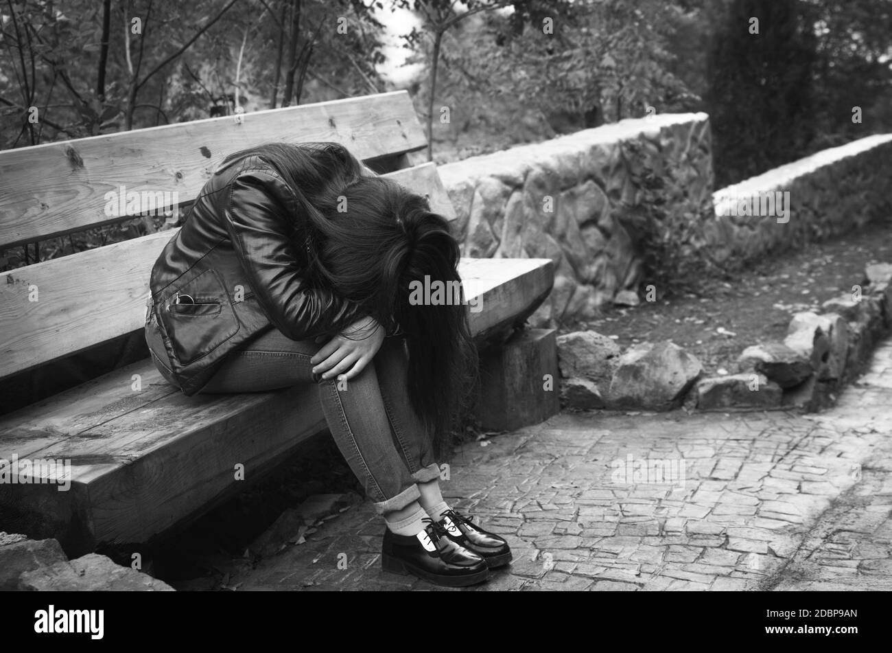 Sad Girl Sitting Alone On Bench