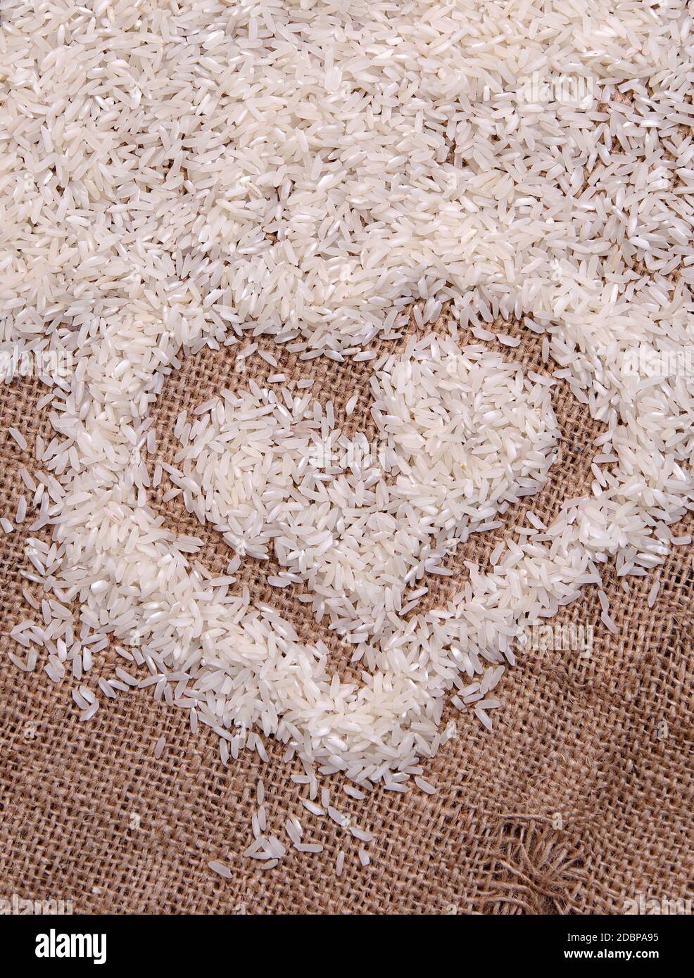rice heart shaped on table Stock Photo - Alamy