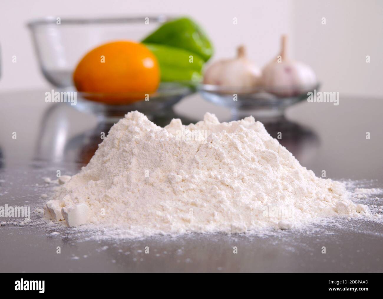 Flour on a table is ready to use for cooking Stock Photo - Alamy
