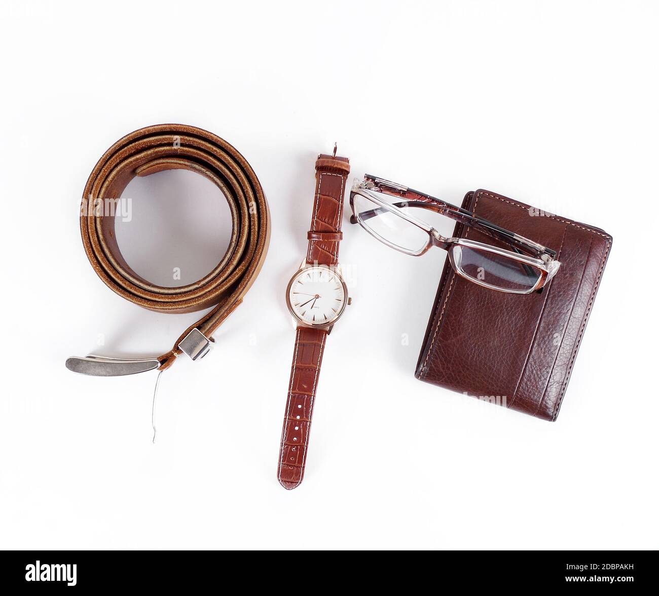 male objects. watch,belt and the wallet Stock Photo - Alamy