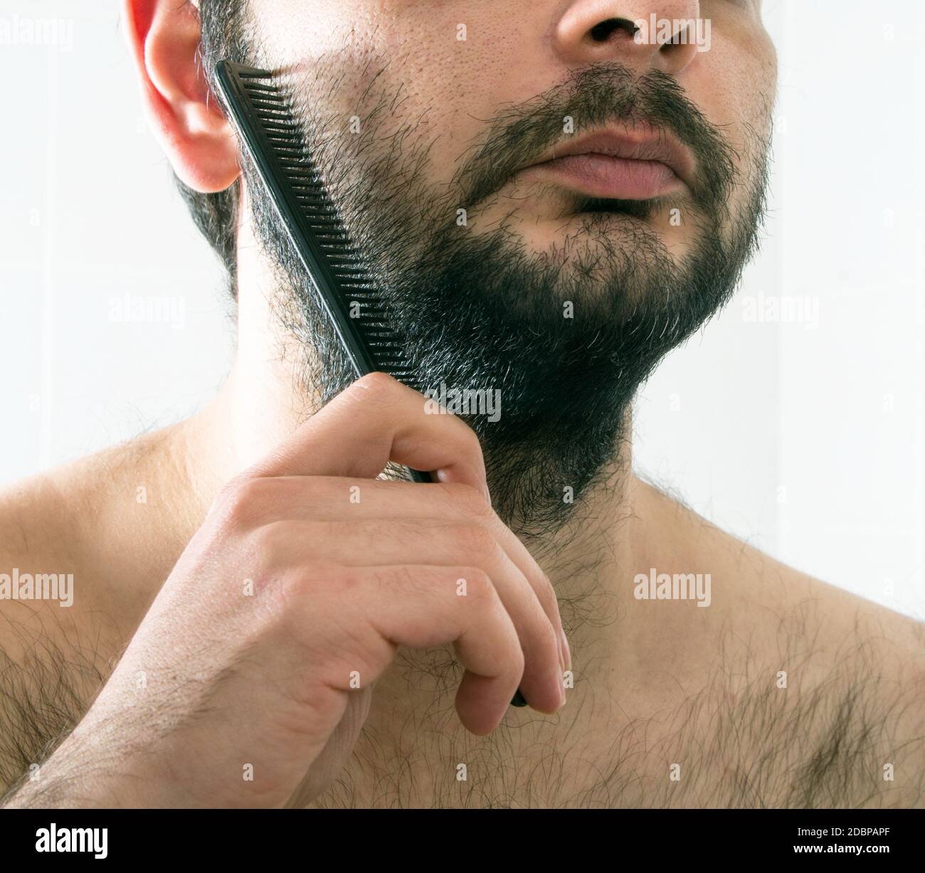 Man combing hair funny hi-res stock photography and images - Alamy