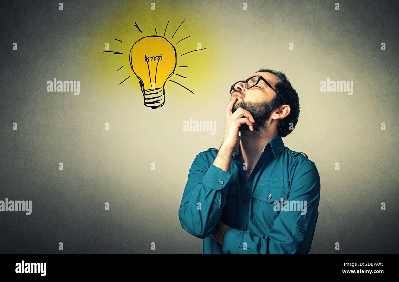 funny geek with glasses has an idea Stock Photo - Alamy