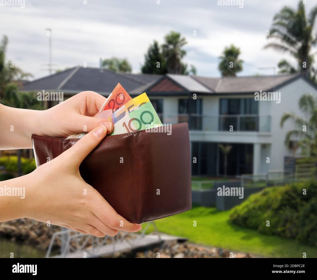australian money in wallet on real estate background Stock Photo - Alamy