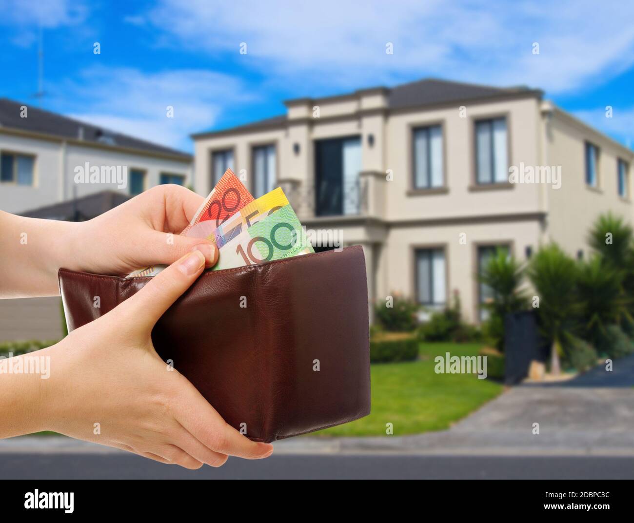 australian money in wallet on real estate background Stock Photo - Alamy