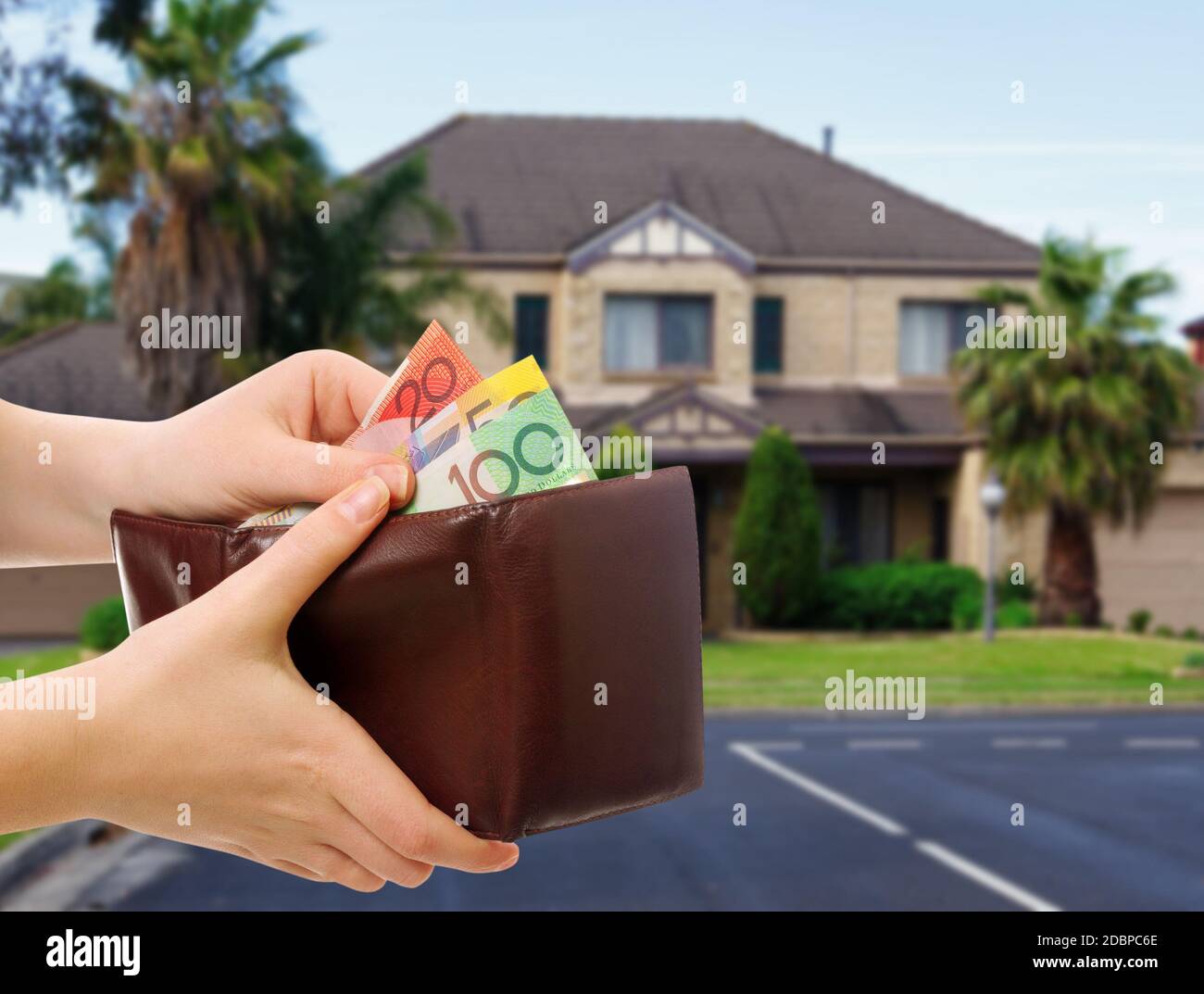 australian money in wallet on real estate background Stock Photo - Alamy