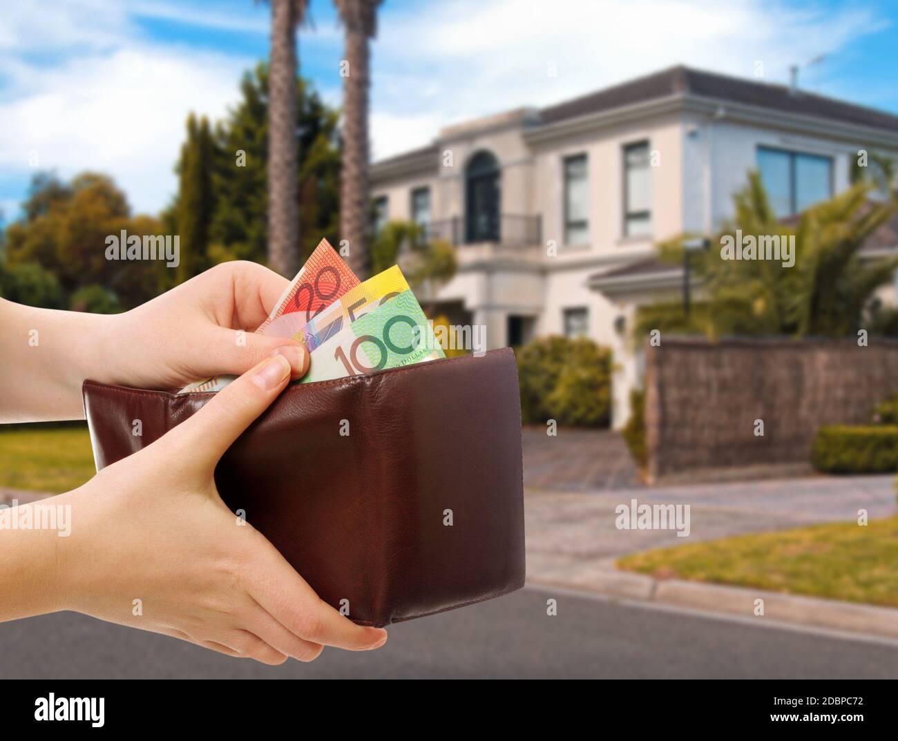 australian money in wallet on real estate background Stock Photo - Alamy