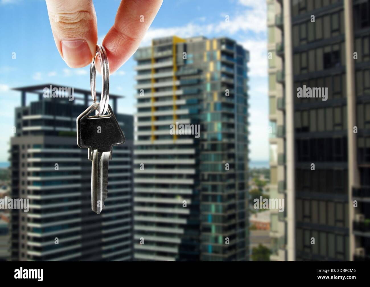 key in hand with real estate Stock Photo - Alamy