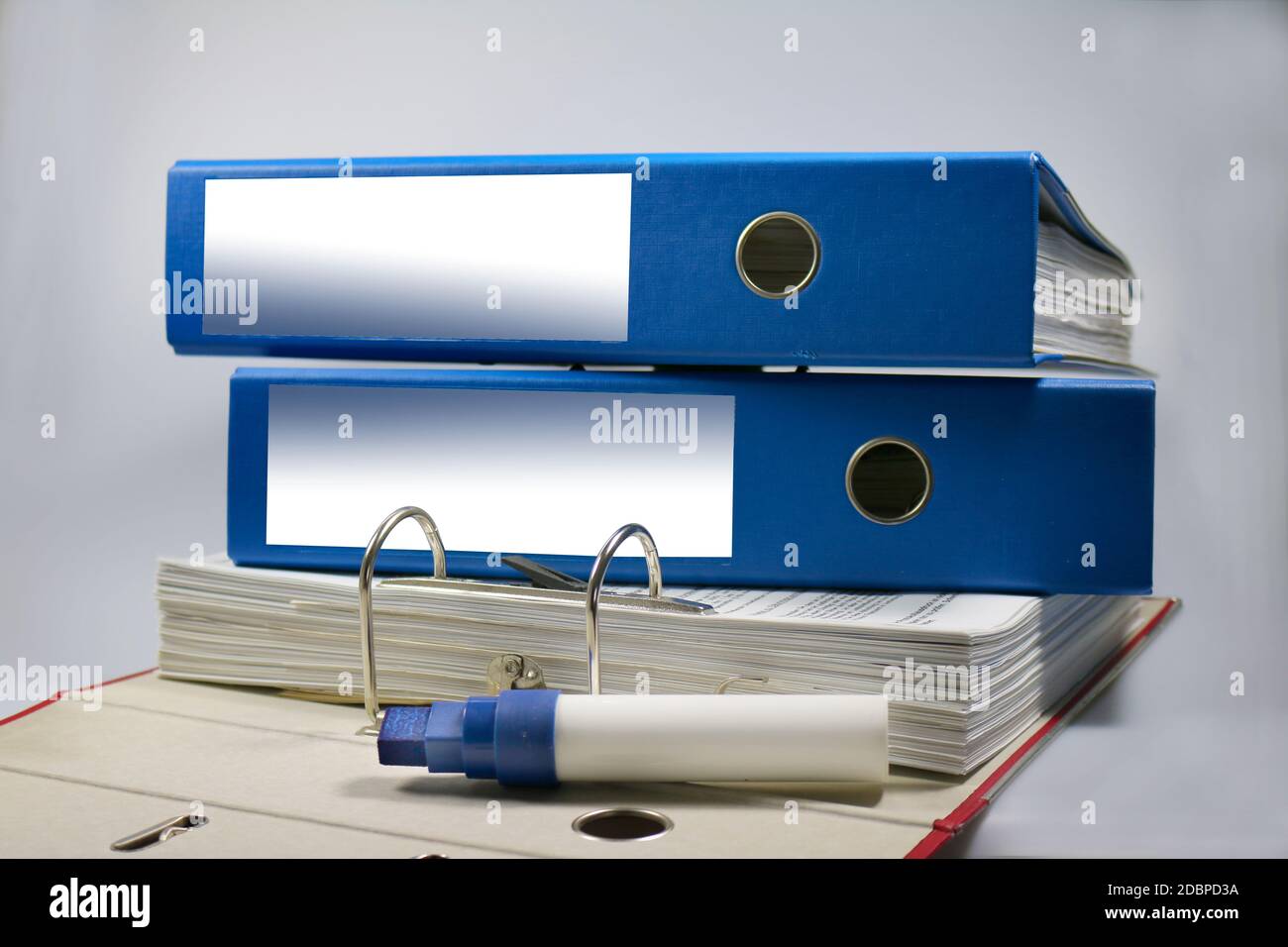 Blue folders in an office Stock Photo - Alamy