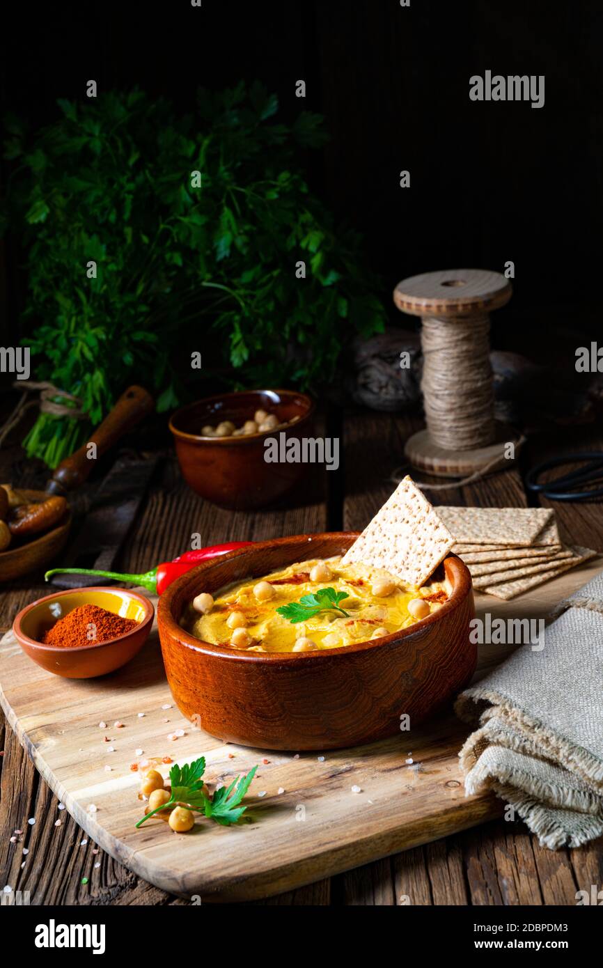 Delicious hummus paste with lemon and chilli Stock Photo - Alamy